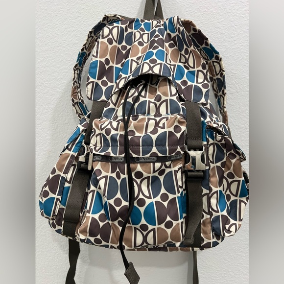 Lesportsac | Bags | Vintage Lesportsac Voyager Backpack Beautiful Tan ...